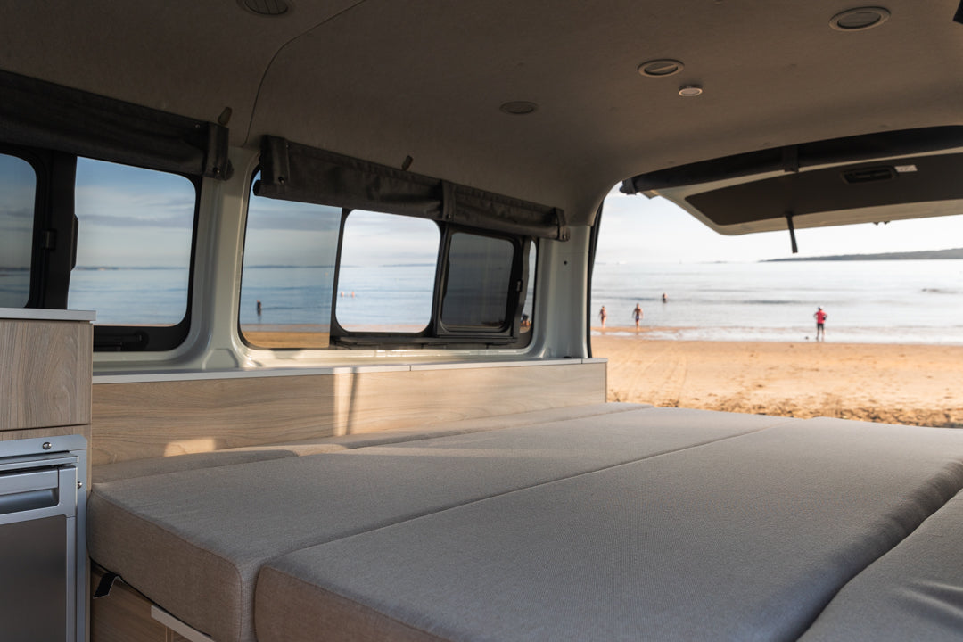 Sleek Wide-Body Toyota Hiace Stealth Camper Conversion